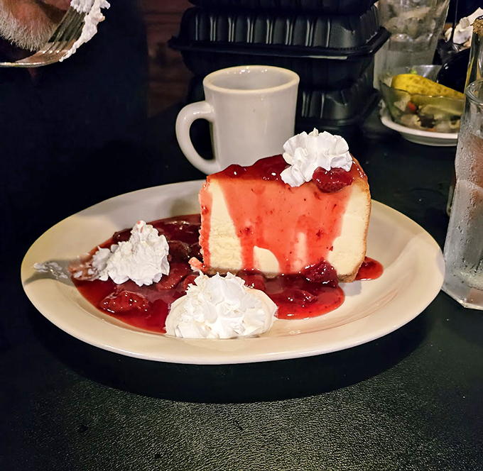 Forget your diet, this cheesecake is worth every calorie. Creamy, dreamy, and topped with a berry sauce that's practically drinkable. It's the kind of dessert that turns "I'll just have a bite" into "Oops, where did it all go?"