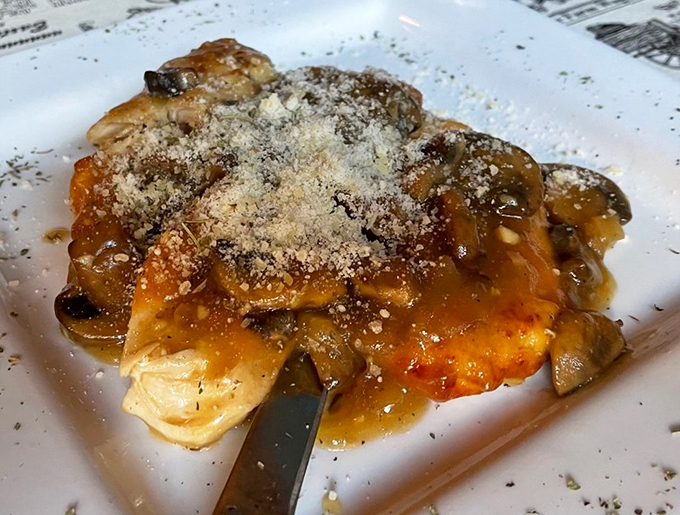 Chicken Marsala so tender, it practically melts on the plate. Those mushrooms have soaked up more wine than your Uncle Tony at Christmas dinner.