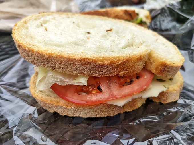 The humble sandwich, elevated to an art form. This beauty could make even the Earl of Sandwich tip his hat in respect.