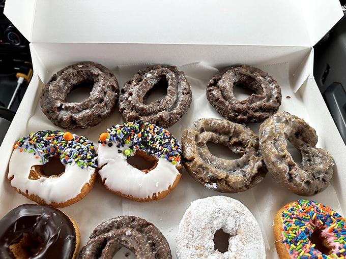 A box of joy, sprinkled with happiness. These donuts are like edible art &ndash; too pretty to eat, but far too delicious not to.