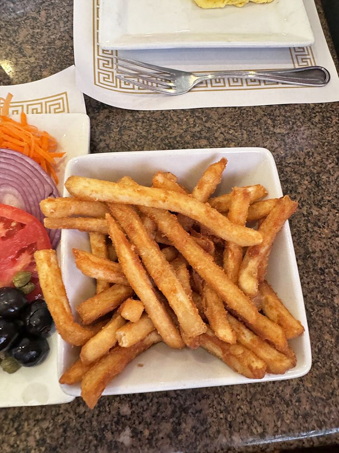 Golden, crispy, and utterly irresistible. These fries aren't just a side dish – they're a supporting actor gunning for the lead role on your plate.