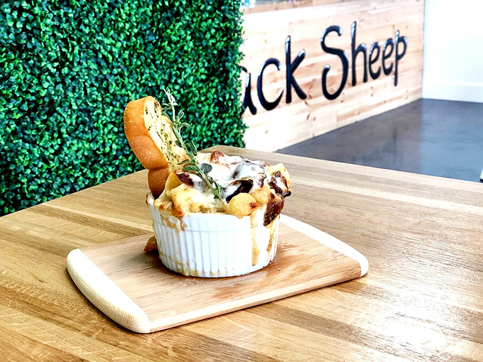 Mac and cheese that's cozier than your favorite sweater. This gooey masterpiece is so comforting, it should come with a warning: "May induce extreme contentment and food coma." Photo credit: Dimitrios S.