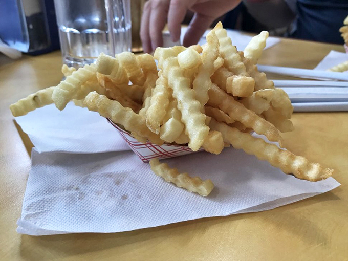 Crinkle-cut perfection! These golden beauties are the Goldilocks of fries - not too thick, not too thin, but just right for maximum crunch satisfaction.