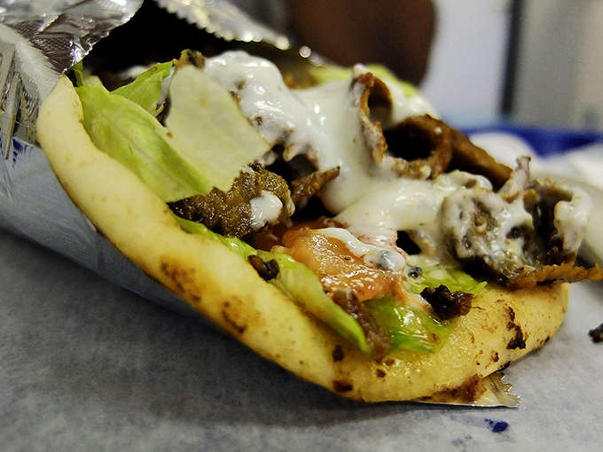 Opa! This gyro is like a warm Mediterranean hug wrapped in pillowy pita. Get ready for a flavor vacation!