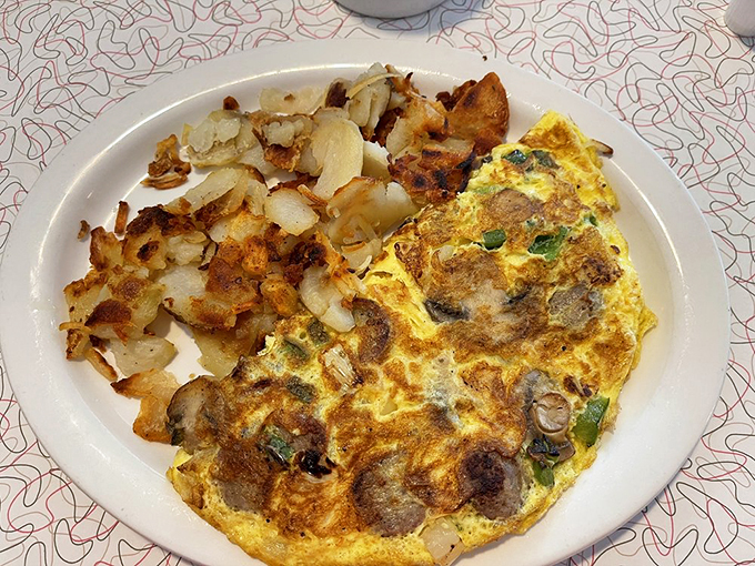 This Italian omelet is so fluffy, it might float away if not anchored by a mountain of crispy potatoes. Mangia!