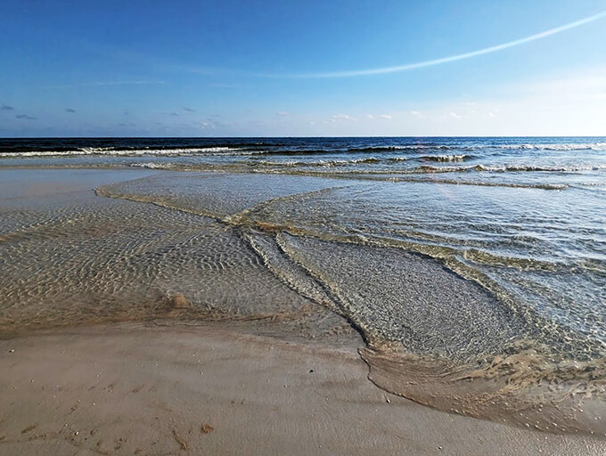 These waves are like nature's lullaby. Gentle, rhythmic, and guaranteed to wash away your stress faster than a sandcastle at high tide.