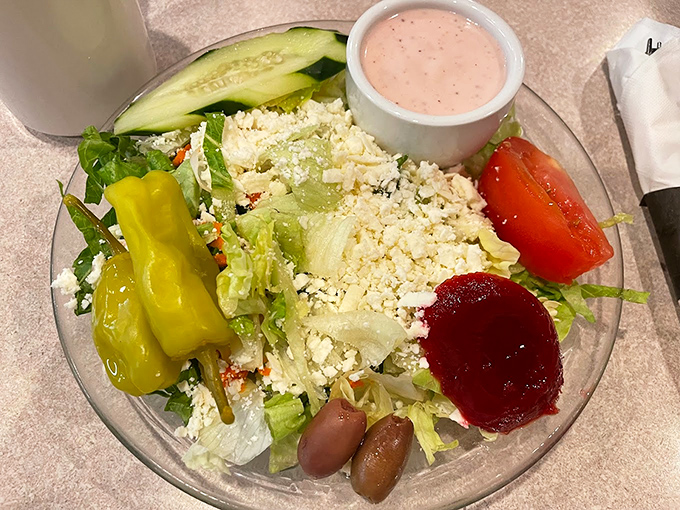 Who says diners can't do healthy? This salad is so fresh, it might just start its own wellness podcast.