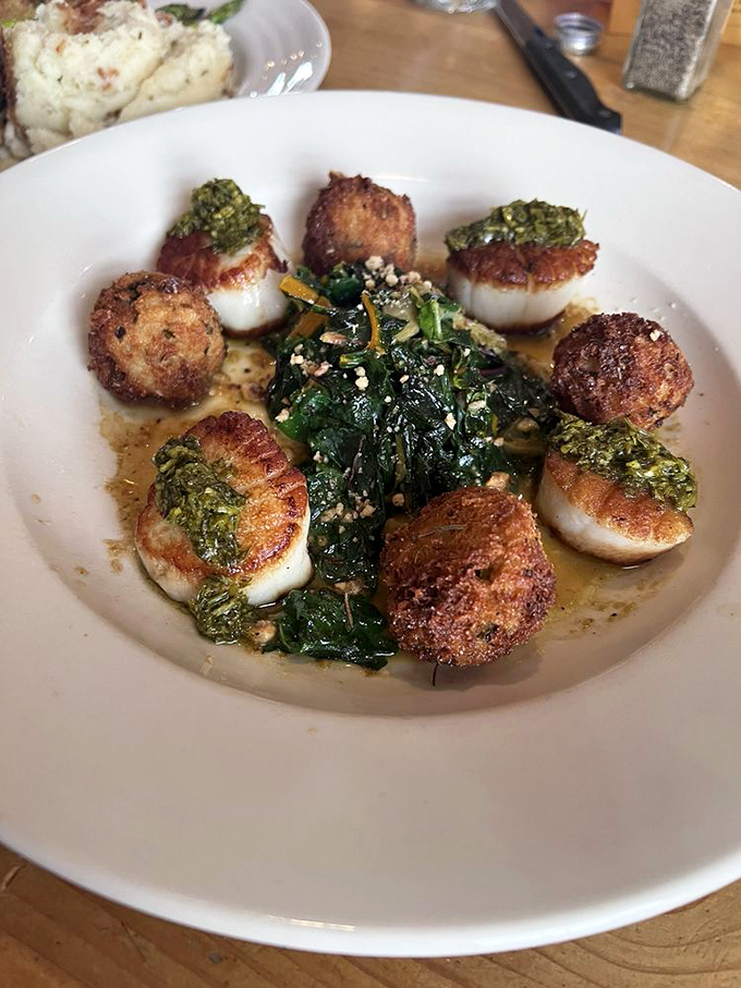 Scallops and greens playing a delicious game of ring-around-the-plate. A dish that's almost too pretty to eat. Almost.