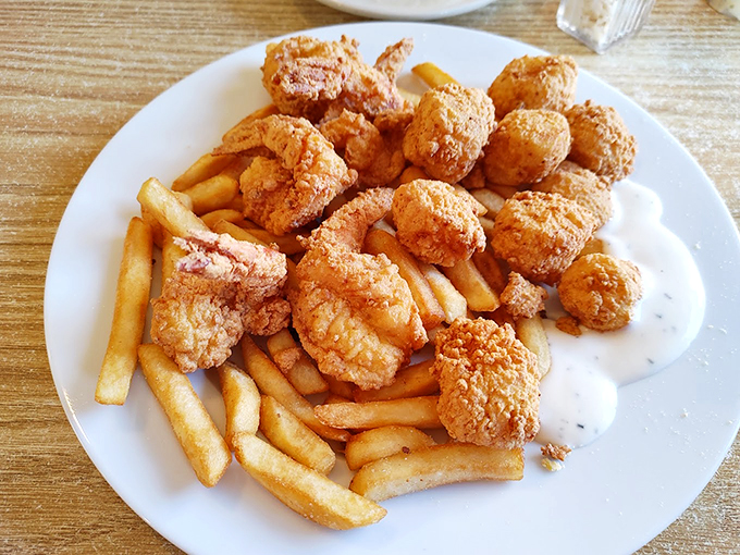 Bite-sized pieces of seafood heaven. These golden scallops are like edible sunshine, brightening up your plate and your day.