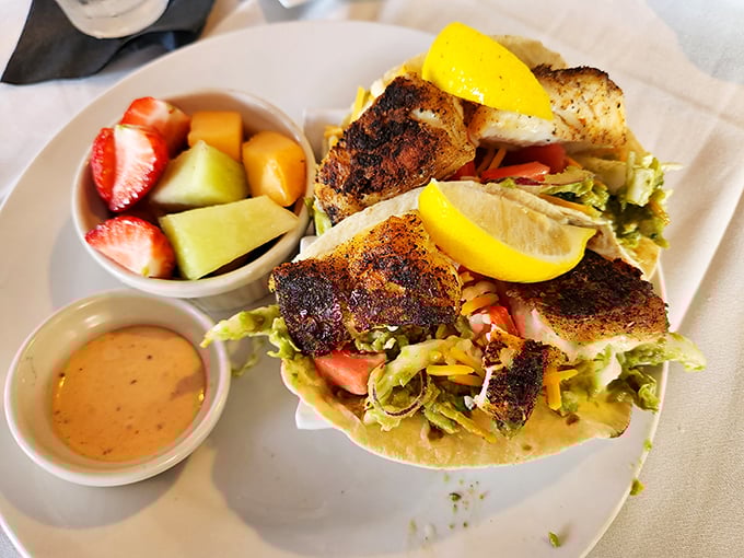 Taco 'bout a flavor fiesta! These tacos are dressed to impress, sporting more colors than a Florida sunset and twice the warmth. Photo credit: John Perry