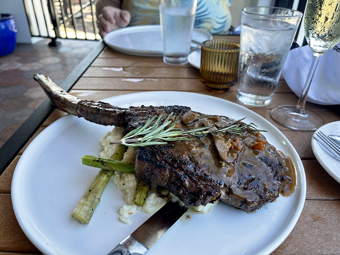 Behold the Flintstone-sized feast! This tomahawk ribeye isn't just a steak; it's a meaty monument to carnivorous cravings. Photo credit: Michele P.