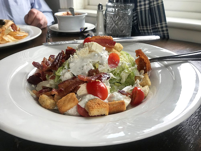 The wedge salad that puts others to shame. It's a crunchy, creamy, bacony masterpiece that might just make you forget you're eating vegetables.
