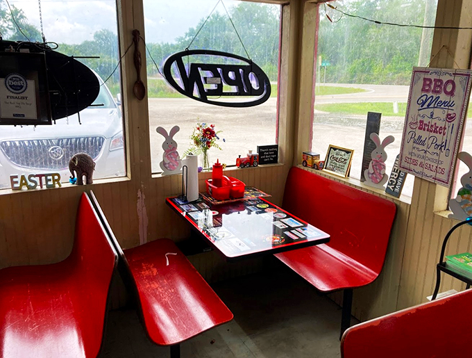 The best seat in the house! This cozy nook offers prime people-watching with a side of comfort food.