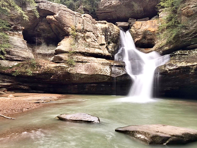 Hemlock-lined paths leading to a waterfall oasis. It's like nature's own red carpet, but greener and less gossipy.