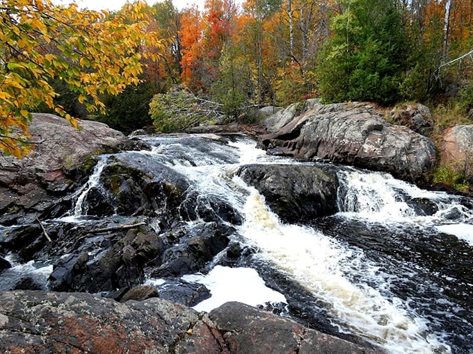 Nature's own waterfall wonderland! It's like stepping into a landscape painting, but with more splashing.