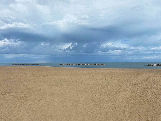 Lighthouse views and sandy shoes &ndash; this beach offers a picture-perfect slice of Lake Erie life. Photo credit: @MissLoraLane
