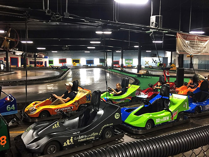 Go-karts line up like colorful candies, promising high-speed thrills in a controlled environment.