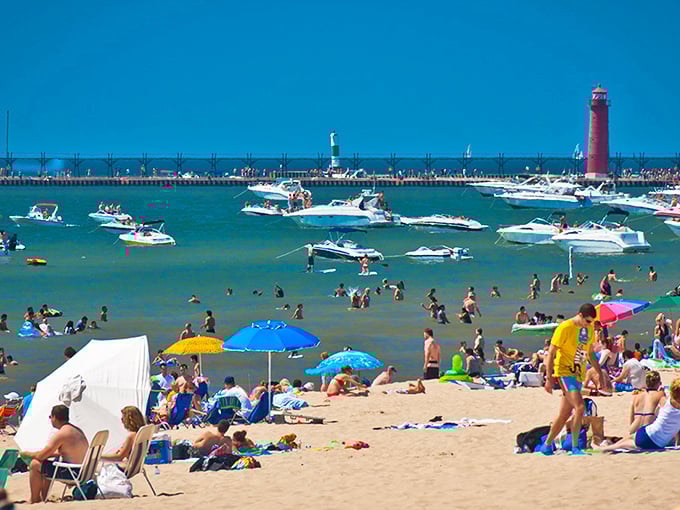 Summer in full swing! Grand Haven's beach scene is a vibrant tapestry of umbrellas, sunbathers, and joy &ndash; like a Where's Waldo of vacation fun.