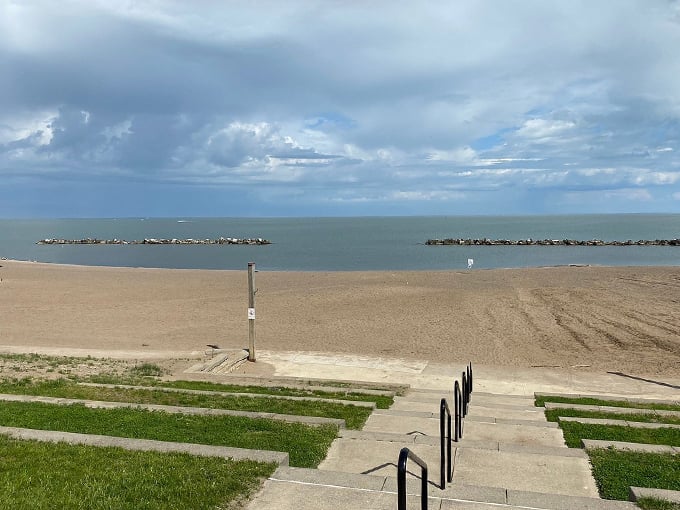 History meets leisure at this charming shore. The lighthouse stands guard over sunbathers and sandcastle builders alike. Photo credit: @MissLoraLane
