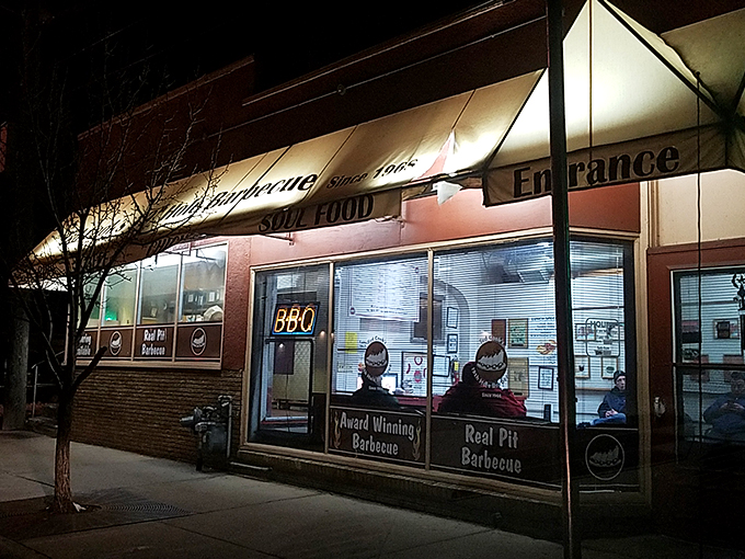 By day, a humble BBQ shack. By night, a beacon of smoky goodness. Ted Cook's is the 19th hole every golfer wishes they'd find. Photo credit: Precious Watson