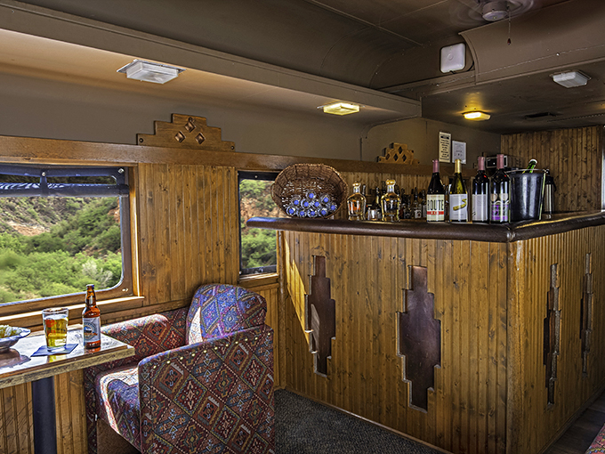 Bottoms up in the bar car! Where else can you sip a cocktail while Mother Nature puts on a show that rivals Broadway?