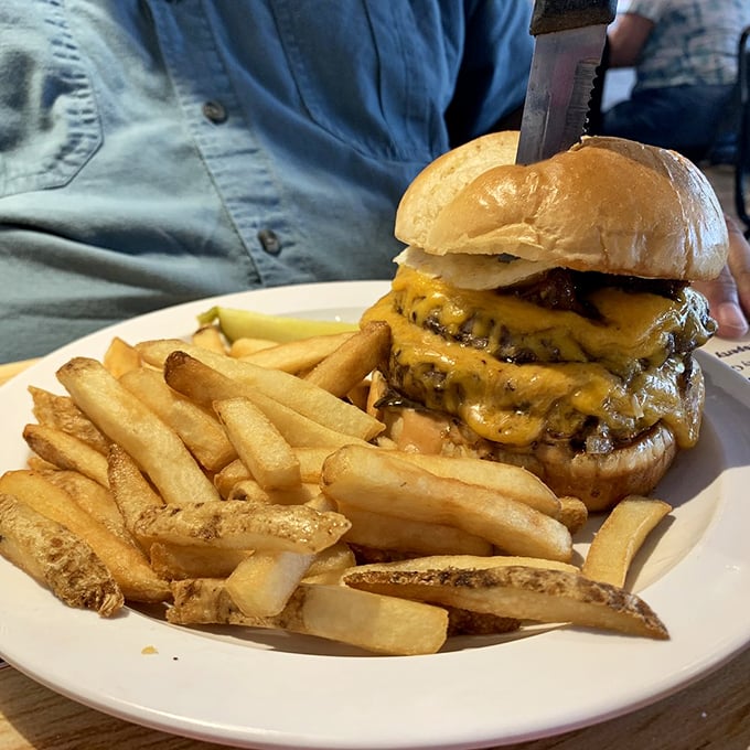 Burger bliss achieved! This juicy masterpiece is so good, you'll want to write home about it &ndash; if you can put it down.