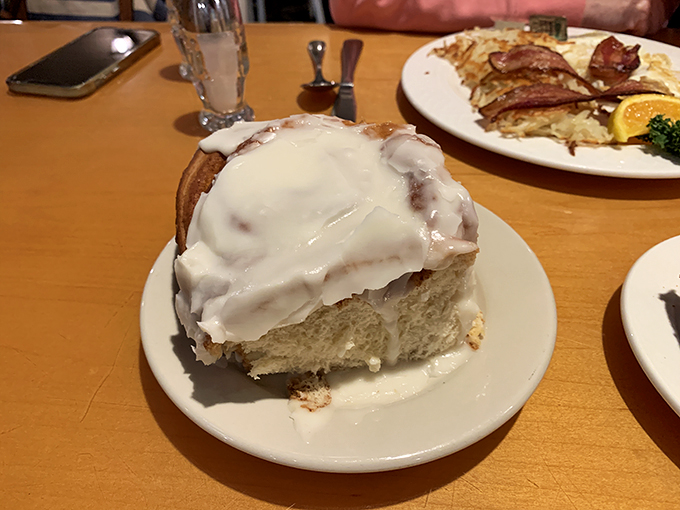 Behold, the cinnamon roll to end all cinnamon rolls! It's not just breakfast, it's a warm hug for your taste buds.