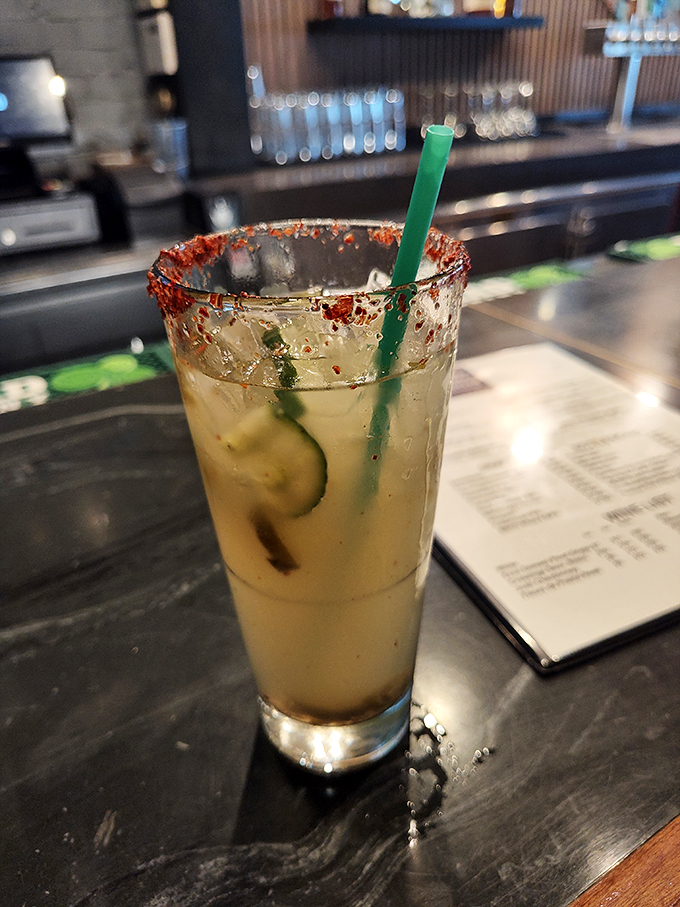 Cheers to creativity! This cocktail looks like it could tell stories wilder than your Uncle Bob at Thanksgiving dinner.