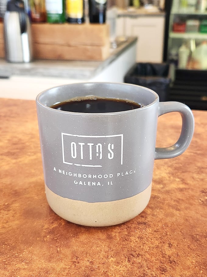 Coffee: The elixir of life, now served in Otto's own mug. Warning: May cause spontaneous happiness and uncontrollable urges to explore Galena.