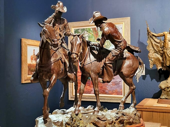 These bronze cowboys are having such an intense conversation, you'd think they were debating the merits of beans versus chili.