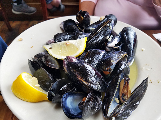 Mussels flexing their culinary muscles! These glistening beauties are ready to dive into a pool of buttery, garlicky bliss.