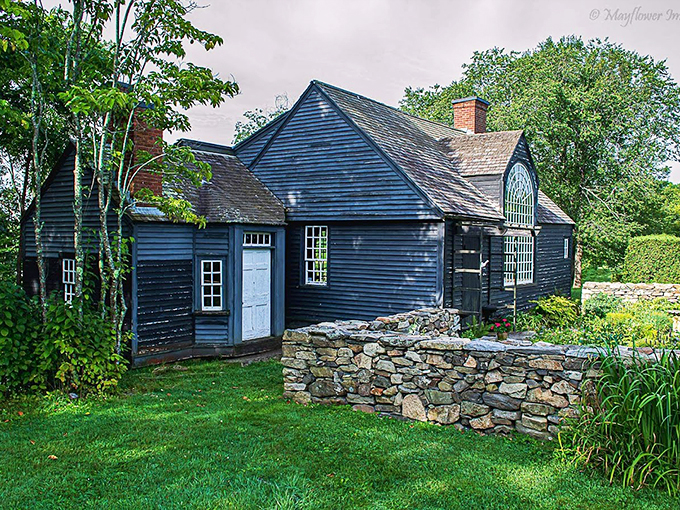 This isn't just an old house; it's a time machine with shingles. Colonial chic meets woodland retreat.