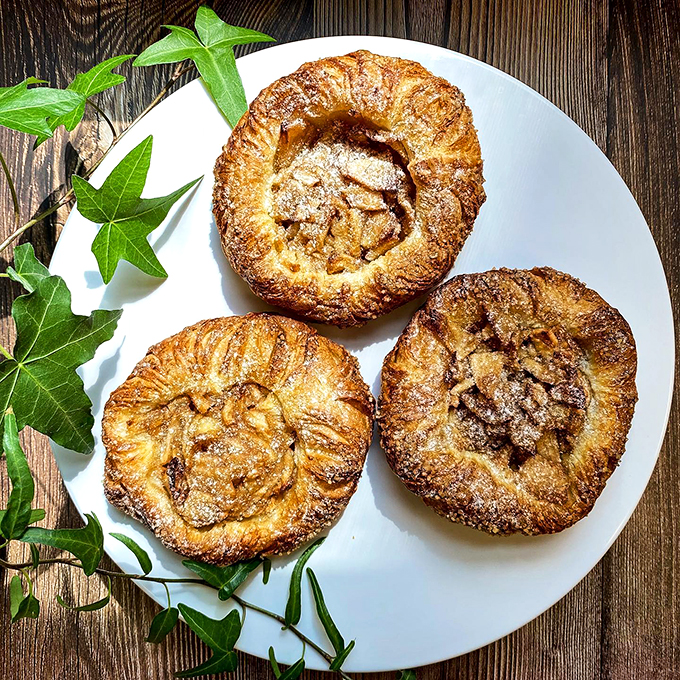 Apple pie meets croissant in a delicious culture clash. It's the pastry equivalent of a beautiful Franco-American alliance.