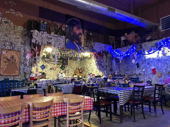 Imagine the stories these walls could tell... if they weren't already covered in a novel's worth of dollar bills! 