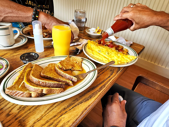 Dot's breakfast spread: where decision-making becomes an Olympic sport. French toast or pancakes? Why choose when you can have it all? Carpe diem, breakfast style!
