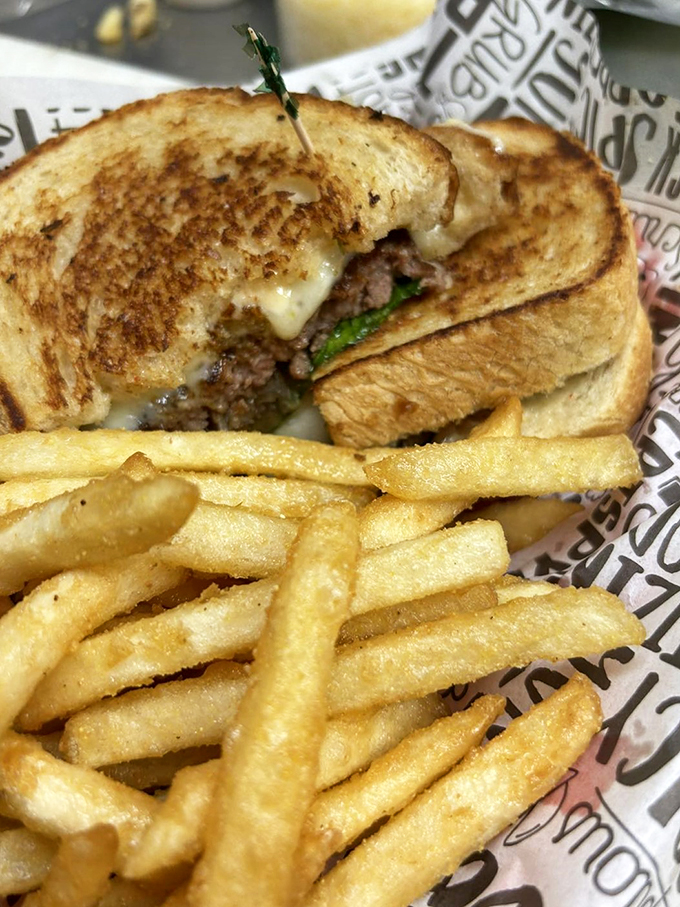 This grilled masterpiece proves that sometimes the best things in life come between two perfectly toasted slices of bread.