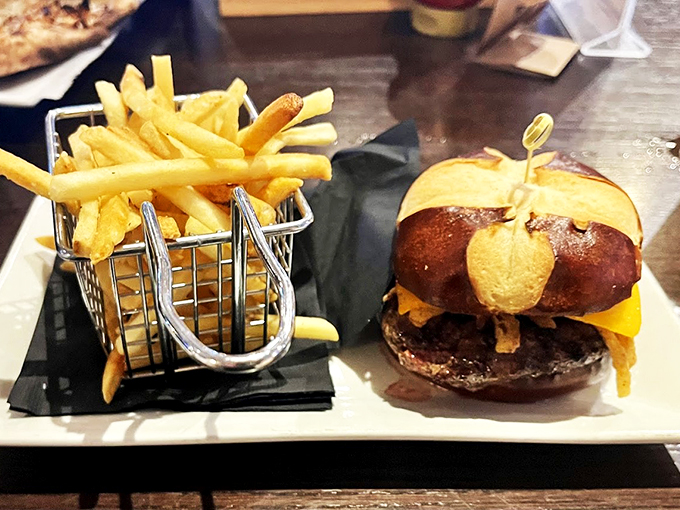 This burger-and-fries combo isn't just a meal, it's a masterpiece served in a basket that screams "comfort food perfection."