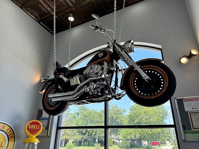 That suspended motorcycle isn't just decor&mdash;it's a conversation starter that's probably heard millions of breakfast orders.