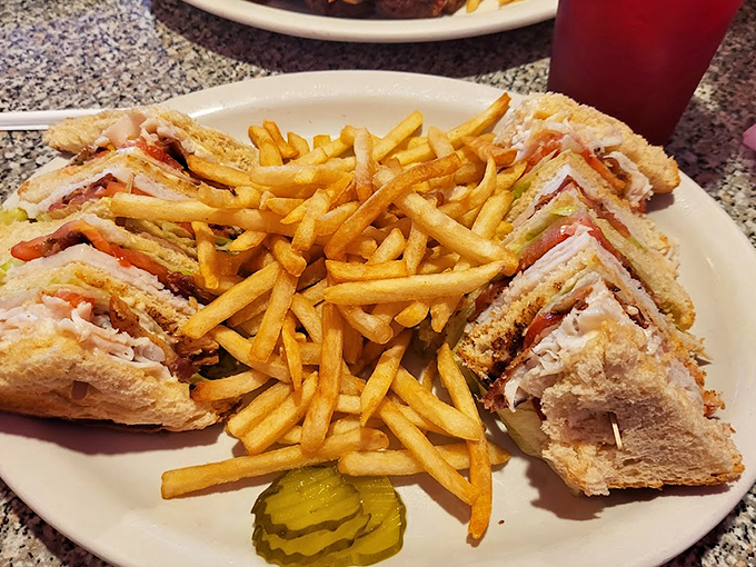 The club sandwich: where turkey, bacon, and lettuce hold a delicious meeting of the minds between three slices of toasted bread. Photo credit: Francisco Rios