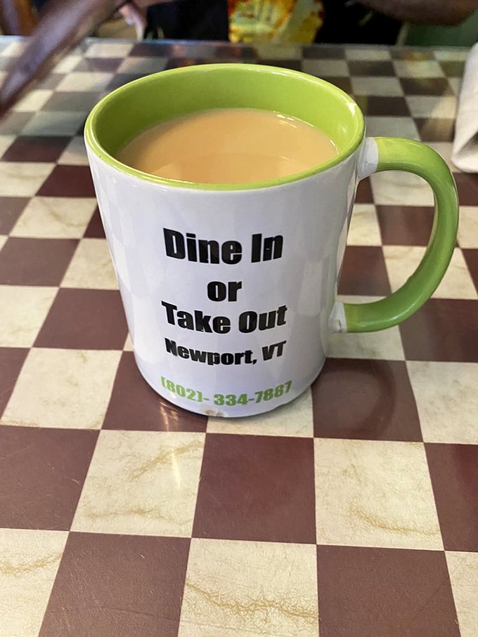 Coffee so inviting, it's practically winking at you. The mug says "Take Out," but your taste buds will beg you to stay.