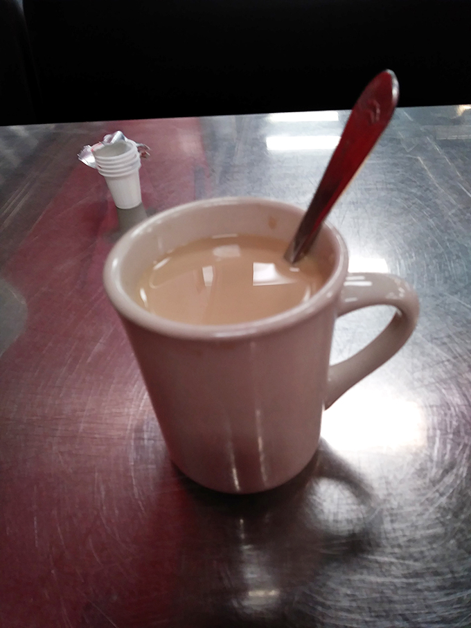 Ah, the elixir of life! This cup of joe is like a warm hug for your insides. Pairs perfectly with... well, everything.