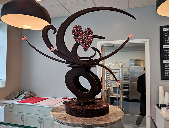 A chocolate sculpture that's pure heart! This whimsical creation proves that at NU Chocolat, confectionery isn't just food - it's an art form.