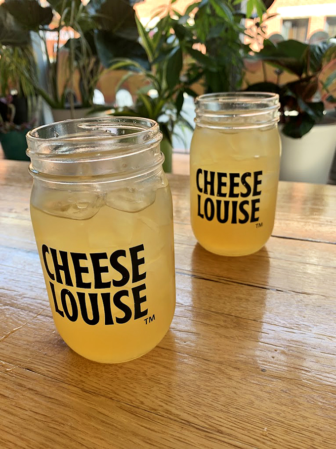 Mason jars filled with sunshine-colored lemonade prove that even drinks can dress up for a cheesy celebration. Photo credit: George Putic