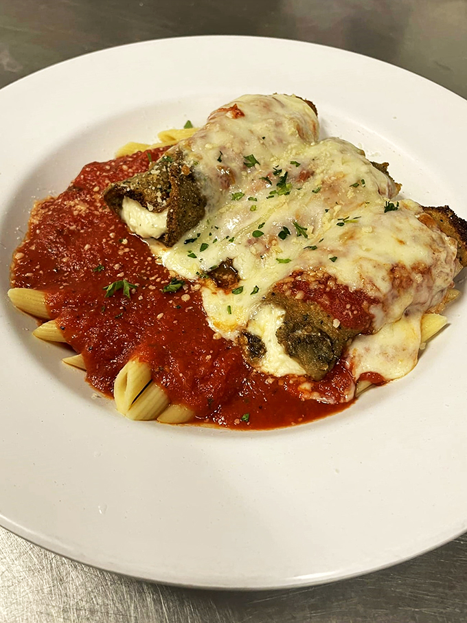 Eggplant Rollatini: Where vegetables go to fulfill their cheesy, saucy dreams. It's like a spa day for your taste buds.