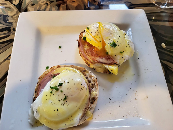 These eggs Benedict are dressed to impress, with hollandaise sauce that's smoother than a jazz saxophone solo. Photo credit: Evia Hodge