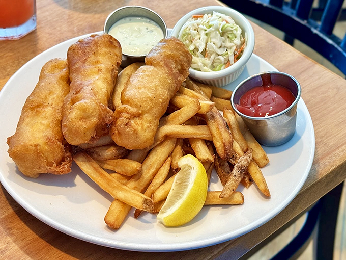 Golden-brown fish and chips that would make a British pub jealous, served with enough fries to share (but you won't want to). Photo credit: Beau MacDonnell