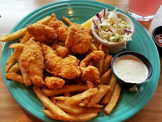 Crispy, flaky fish and chips that would make a British pub raise its glass in respect.