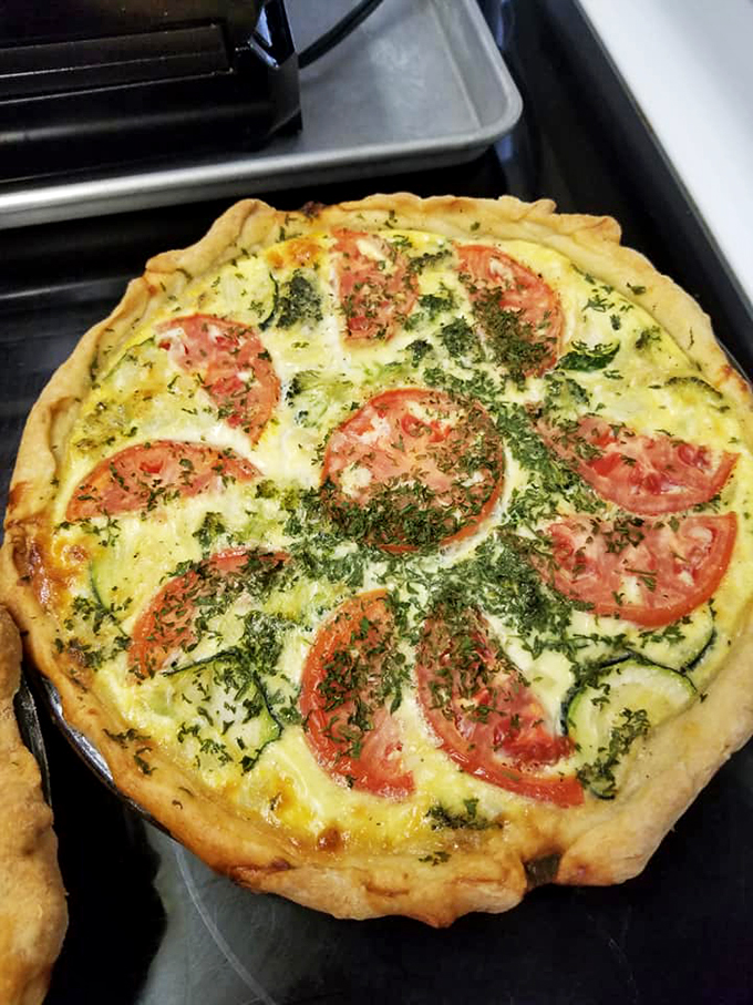 Who said eating your veggies can't be fun? This quiche is like a garden party where all the cool vegetables got invited, and cheese crashed the bash.