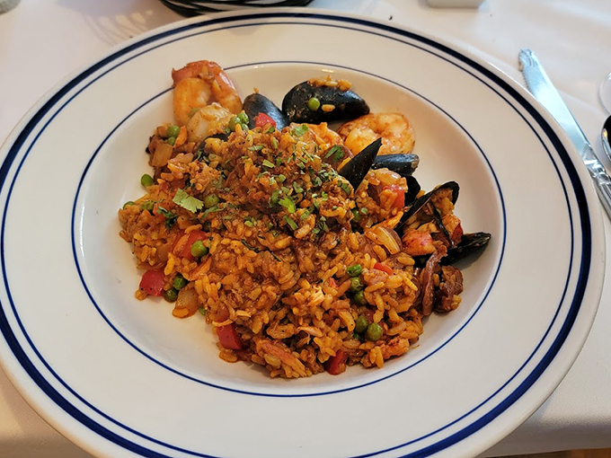 Paella that's having a party with local seafood, and everyone's invited! Just look at those perfectly cooked mussels.