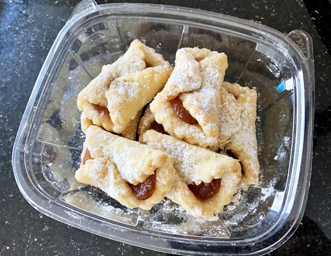 Delicate, powdered sugar-dusted pastries that look like they floated down from dessert heaven, complete with fruit filling.